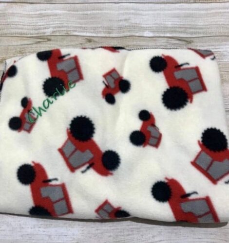 Personalised baby blanket cream with red tractors-any name – Pwyth Pistyll